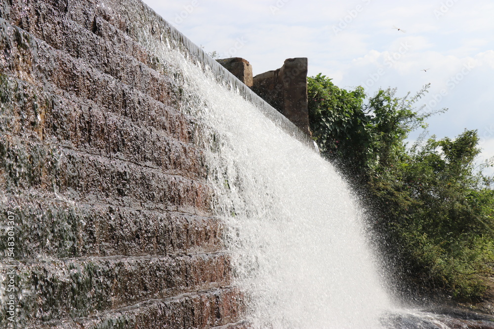 Water flowing through bricks from a overflowing dams reservoir Stock ...