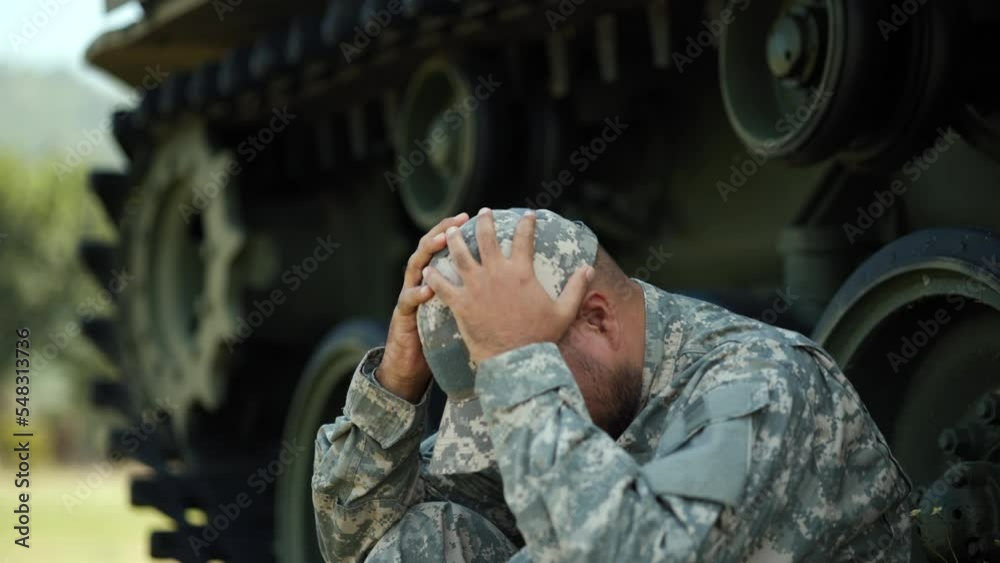 Crying soldier man in military uniform special forces standing against ...