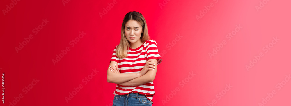 Upset timid insecure frowning asian blond girl feel offended, block ...