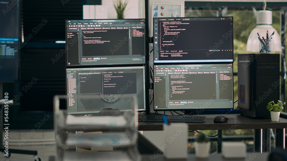 Multiple Screens Showing Programming Code In Empty Software It Agency Desk Parsing Database