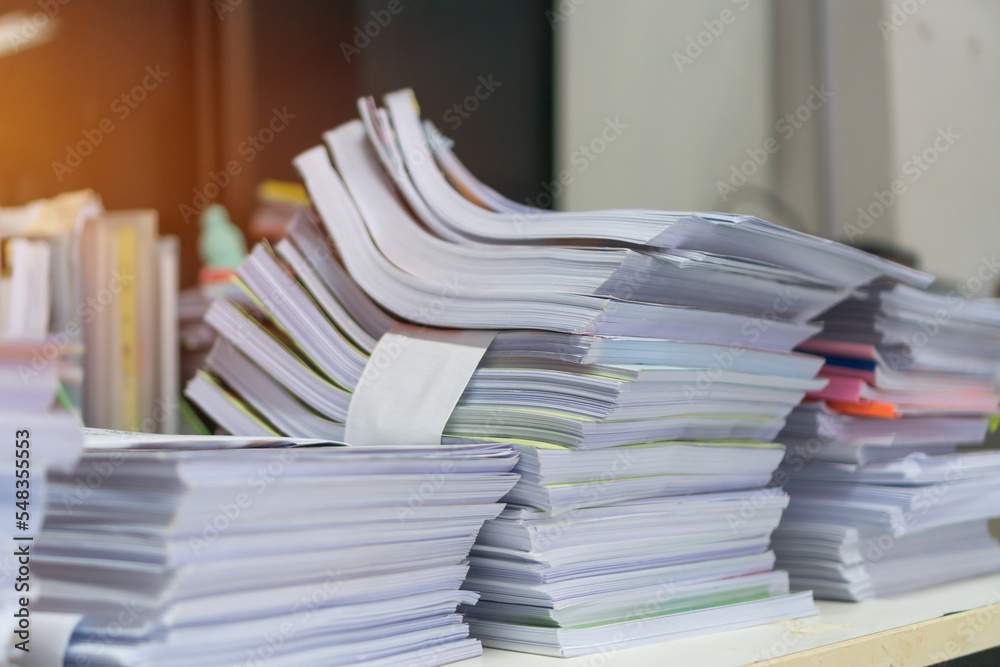 Pile of Tax Document papers or paperwork file unfinished report on ...