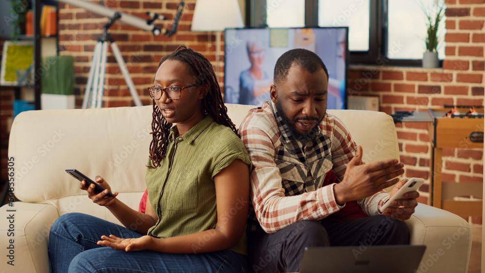 Angry couple having argument and fighting at home, dealing with ...