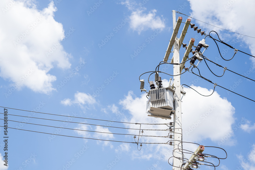 high voltage transmission line Install wires on electric poles. Stock ...