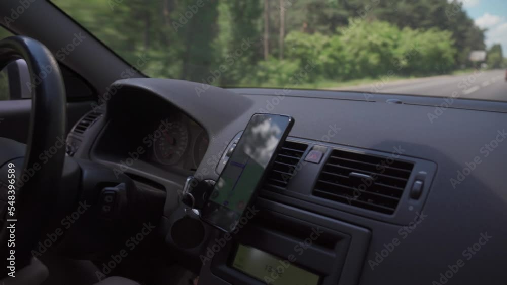 Video Stock Driver using maps app for showing right route on smartphone ...