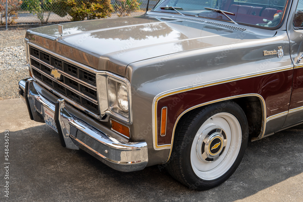 Headlights of beige and brown Chevrolet C10 Pickup. Chevrolet Silverado ...