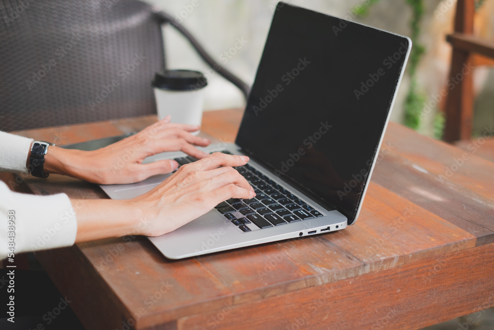 Close up look of hand is typing on laptop or notebook. Concept of black ...