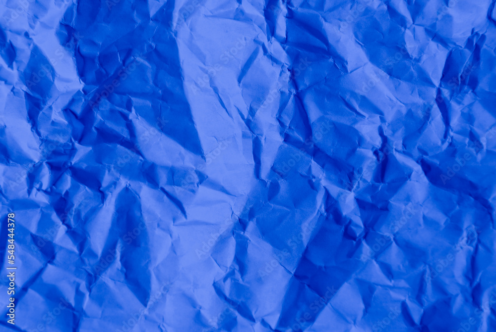 Crumpled blue paper, great background for web pages, collages, layouts ...