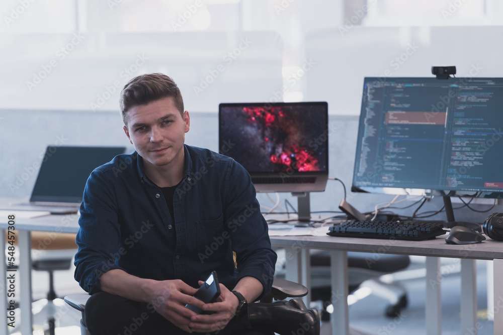 Programming Man Working On Computer In It Office Sitting At Desk Writing Codes Programmer