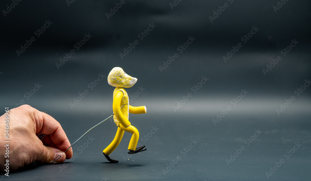 Stopmotion process of walking. Fifth step. Man's hand holding with an ...