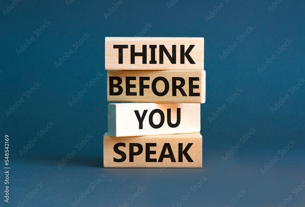 Think before you speak symbol. Concept words Think before you speak on wooden cubes. Beautiful ...
