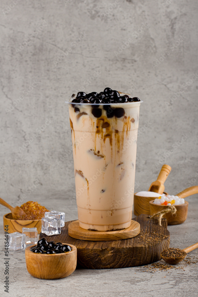 Boba or tapioca pearls is taiwan bubble milk tea in plastic cup with ...