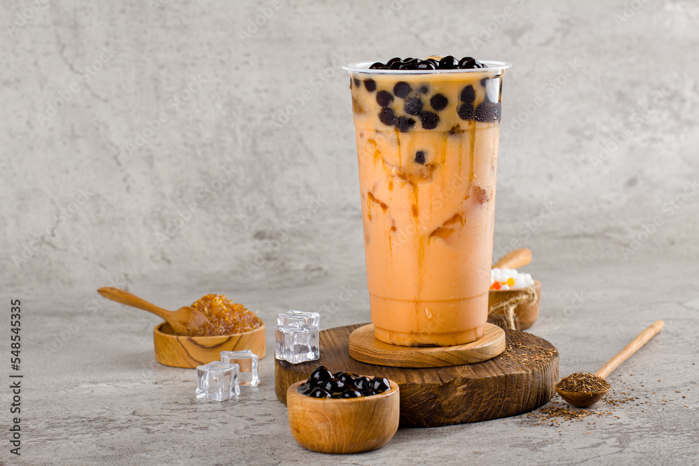 Boba or tapioca pearls is taiwan bubble milk tea in plastic cup with ...