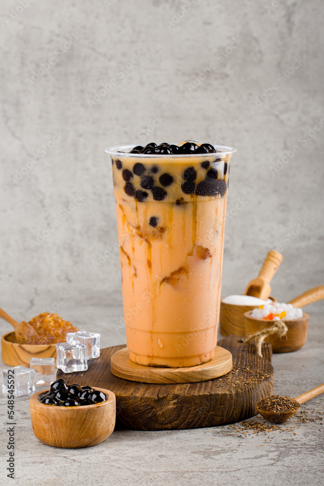 Boba or tapioca pearls is taiwan bubble milk tea in plastic cup with ...