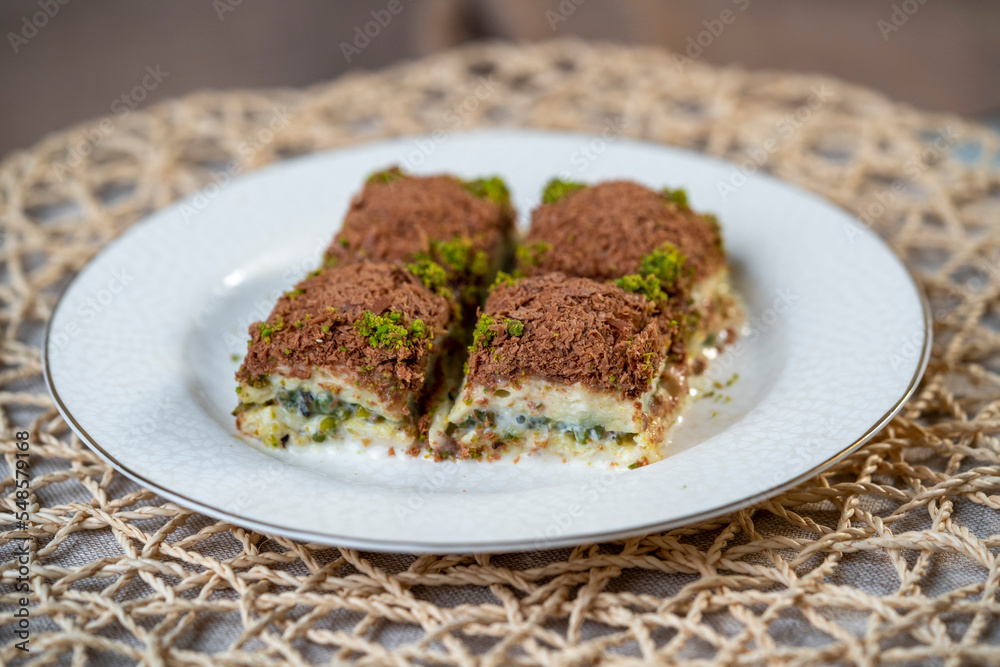 Traditional Turkish dessert cold baklava in the plate. Geleneksel Soguk ...