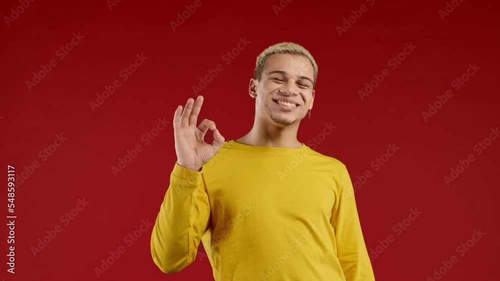 Handsome man makes hand sign okay, ok gesture. Happy guy, correct ...