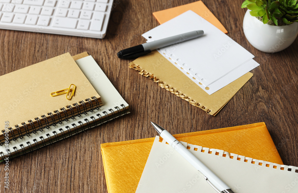 wooden office table with yellow notepad and supplies. Table. Top view ...