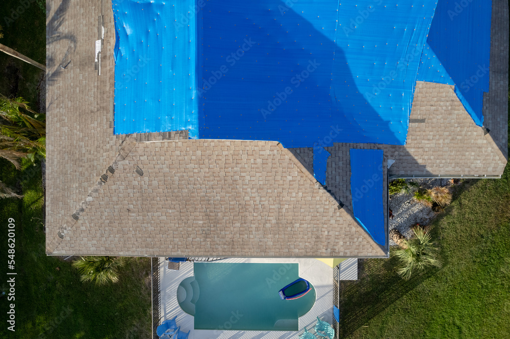Hurricane Ian destroyed homes in Florida residential area blue tarp ...