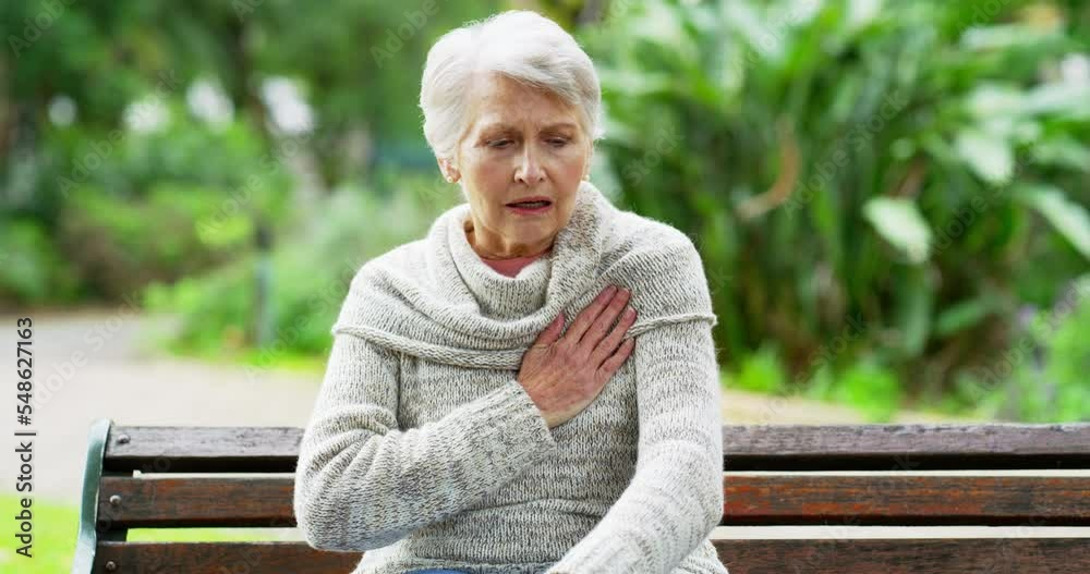 Senior woman, heart attack and bench in park, garden and medical pain ...