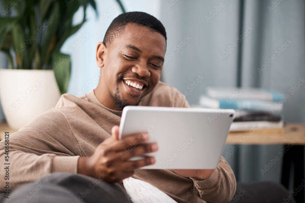Tablet, happy or black man on social media to relax or enjoy comedy ...