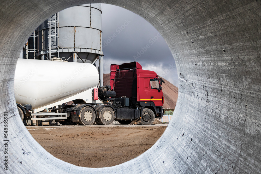 Machine for transporting cement in a concrete factory. Close-up. Supply ...