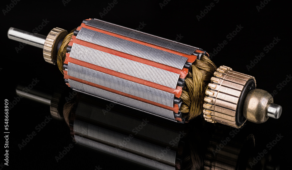 DC motor rotor with reflection on black background. rotary electrical ...