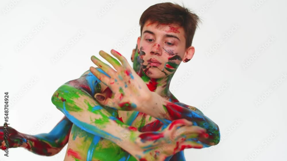 Performance in the style of body-art on a white background. Caucasian ...