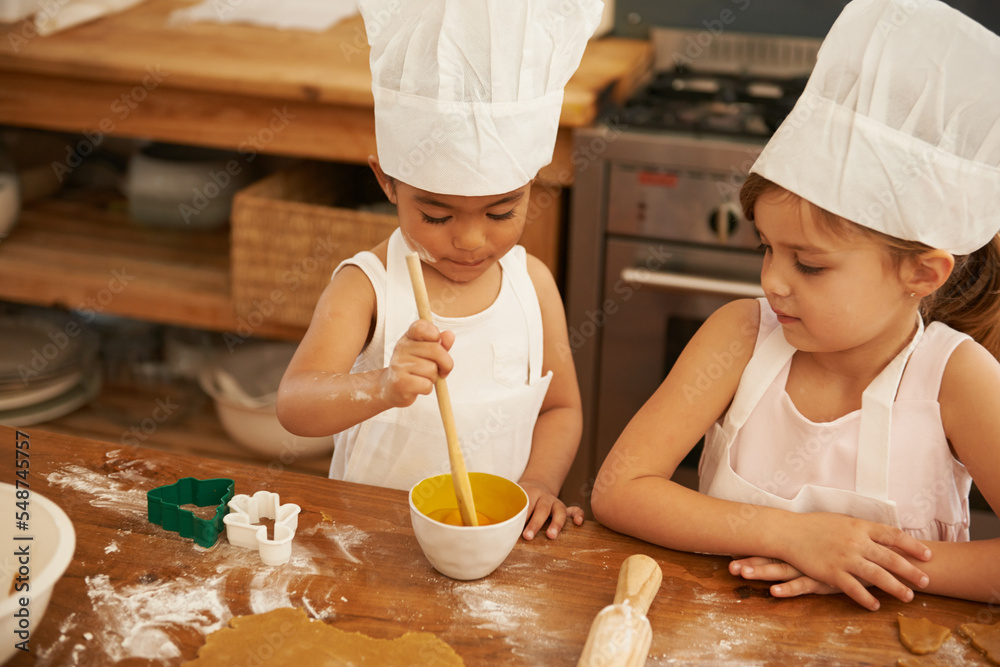Children, learning and baking in a kitchen with girls bonding, curious ...