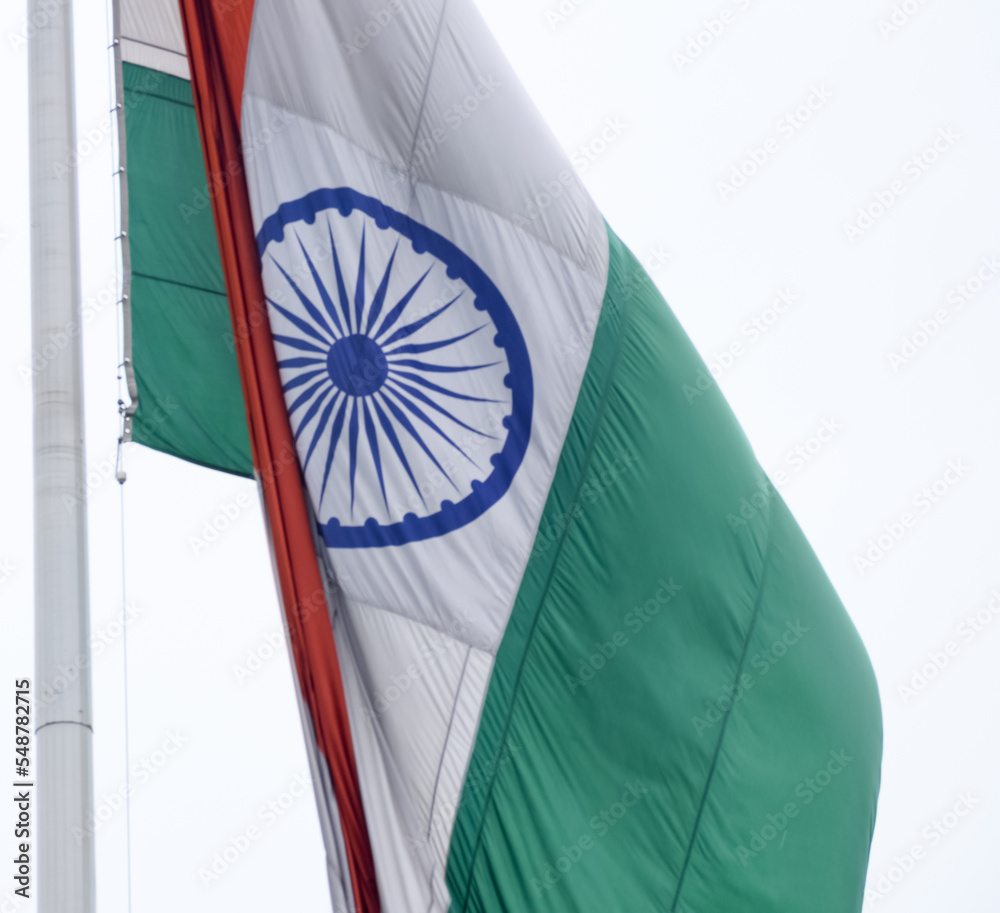 India flag flying high at Connaught Place with pride in blue sky, India ...