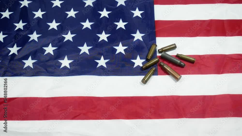 American flag with bullets, shells, cartridges and projectiles on it ...