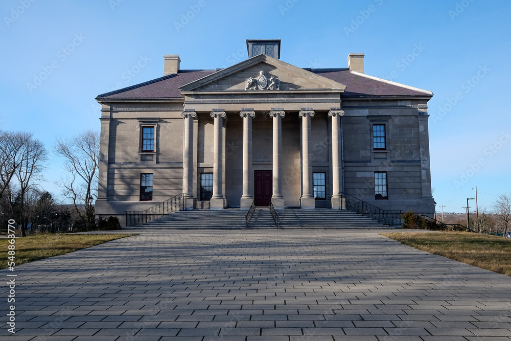 The exterior facade of a historic government building with large ...
