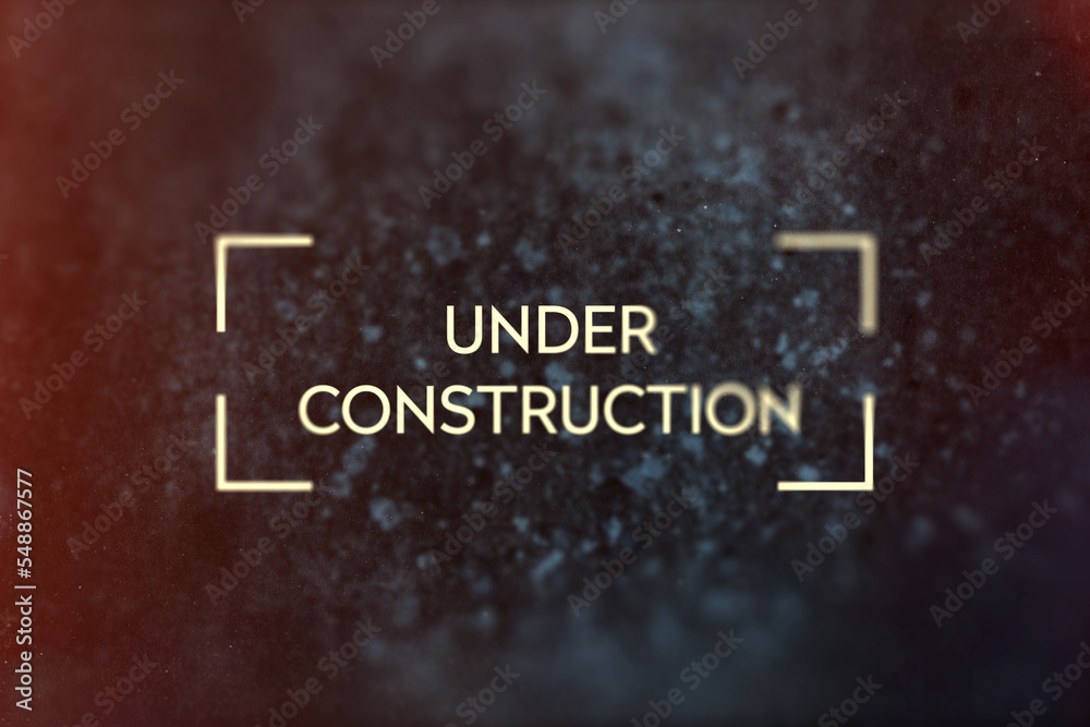 Under construction title, grunge style with grain and partial blur ...