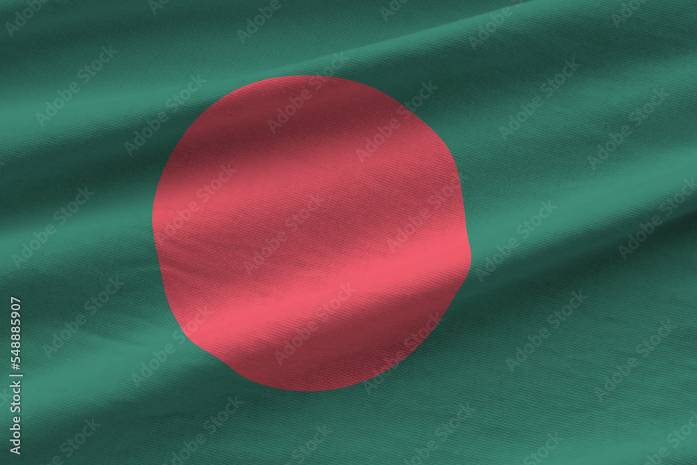 Bangladesh flag with big folds waving close up under the studio light ...