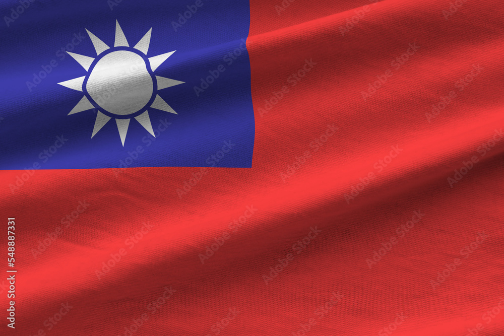 Taiwan flag with big folds waving close up under the studio light ...