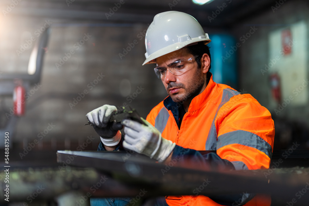 Man worker using Vernier Caliper measuring the thickness of the steel ...