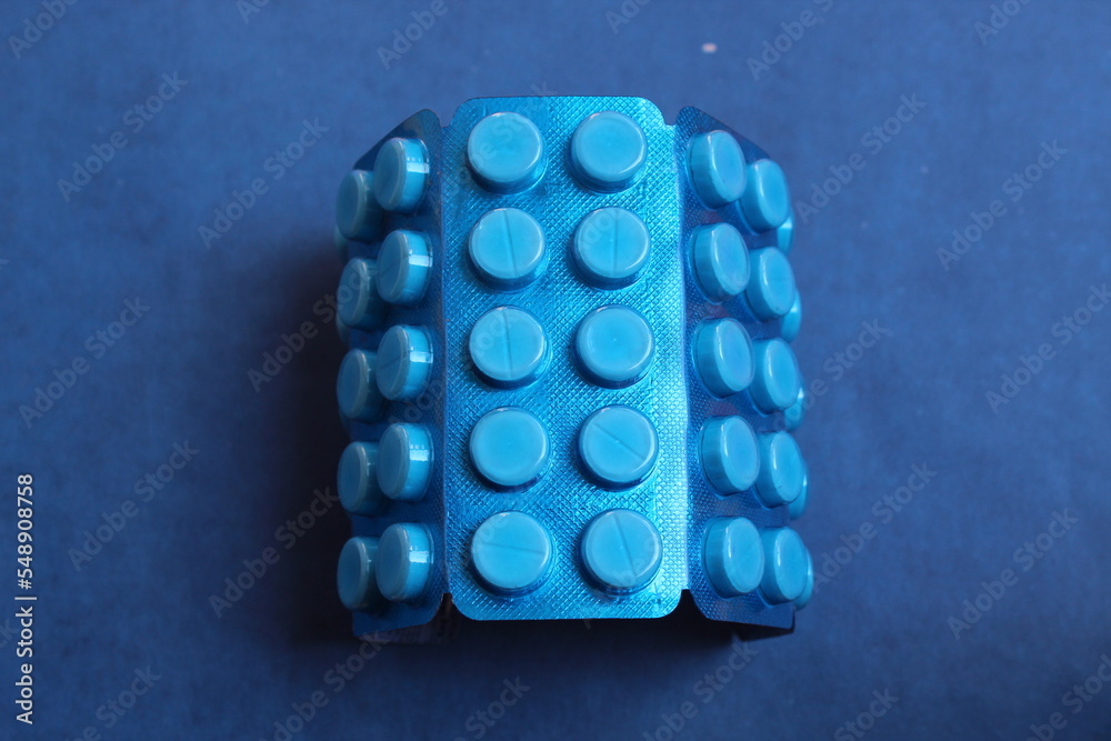 Paracetamol tablets package on a plain background used for fever Stock ...