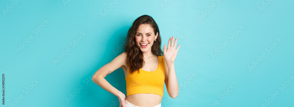Summer holidays and emotions concept. Cheerful friendly woman with ...