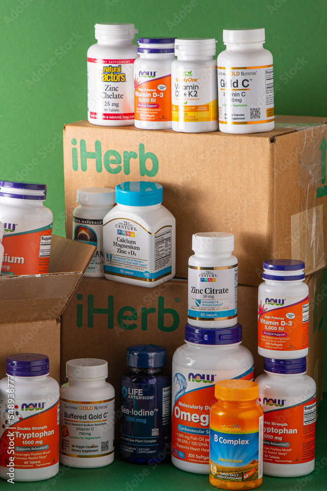 Vitamins, minerals and micronutrients from iHerb box. Lots of different ...