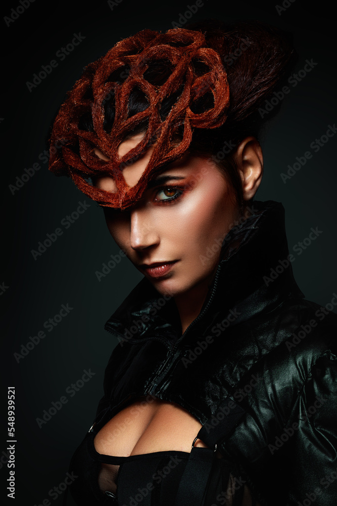 Portrait of a pretty young woman in profile, wearing an avant-garde ...