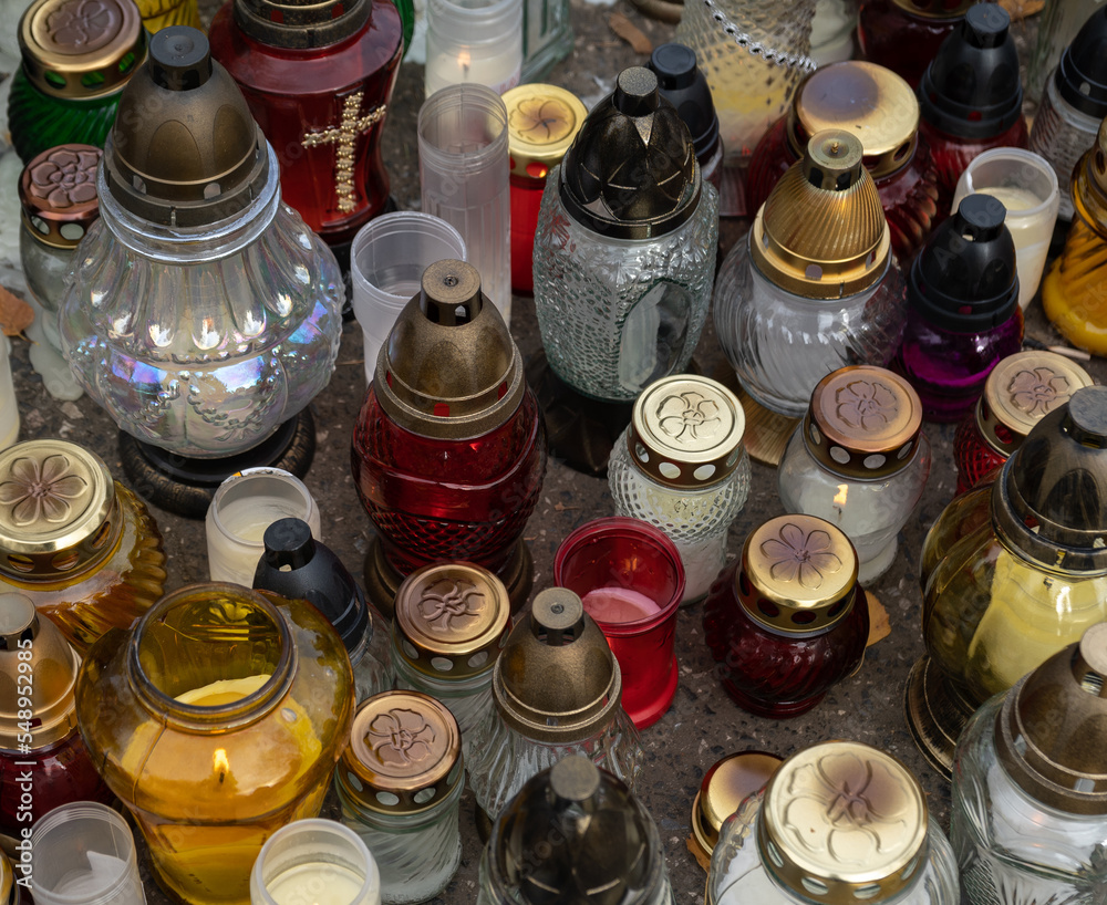 Cemetery grave candle glass lanterns. All Saints' Day, Feast of All ...