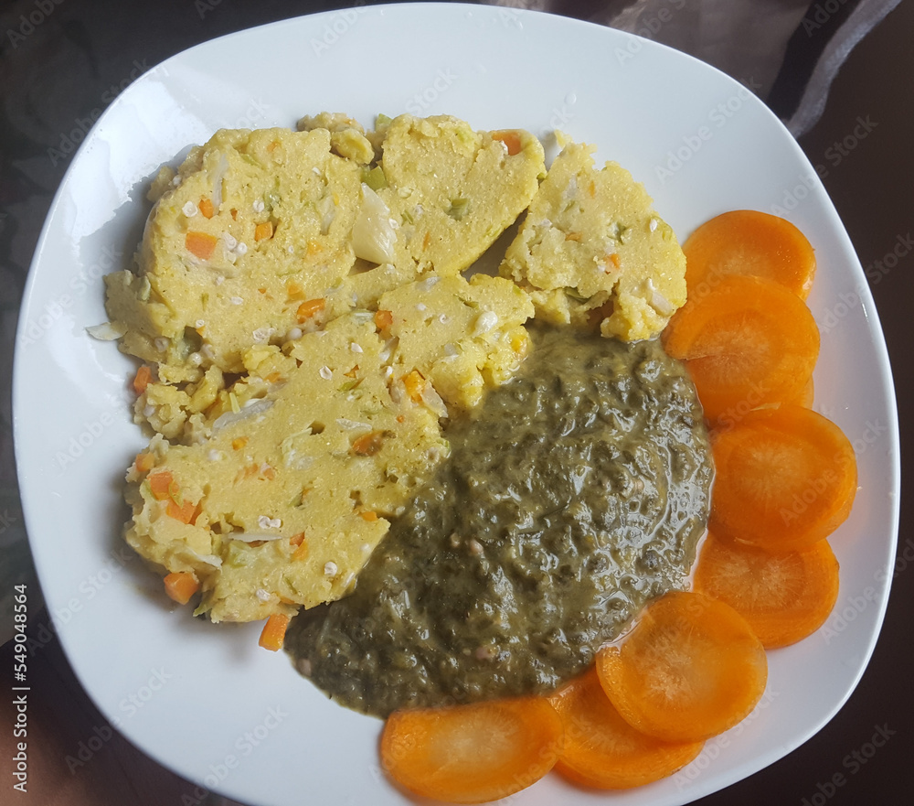 A plate of Trinidad and Tobago's traditional food of Coco, Fufu, or ...