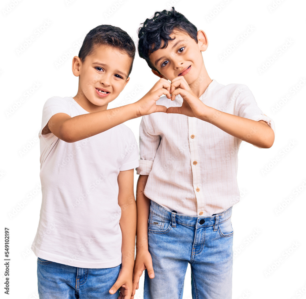 Couple of little brothers together wearing casual clothes smiling in ...