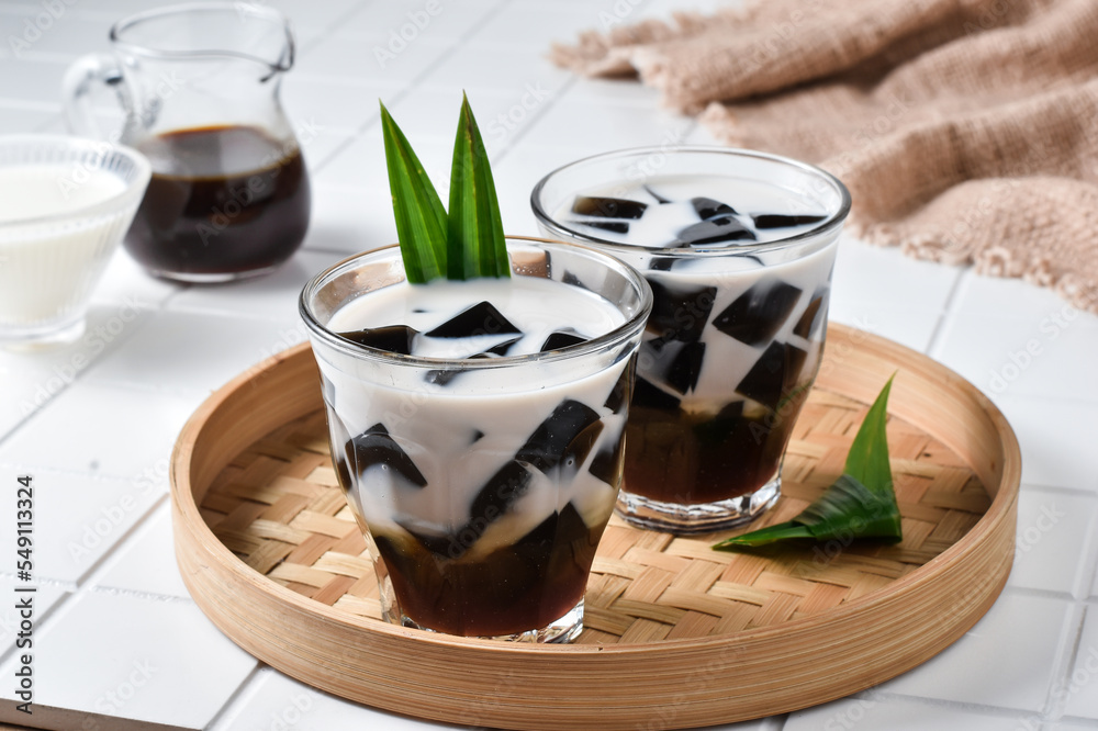 Summer drink Es Cincau Hitam, made from black grass jelly with coconut ...