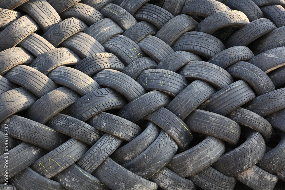 Large waste tyre pile ready for tyre recycling. Stock Photo | Adobe Stock