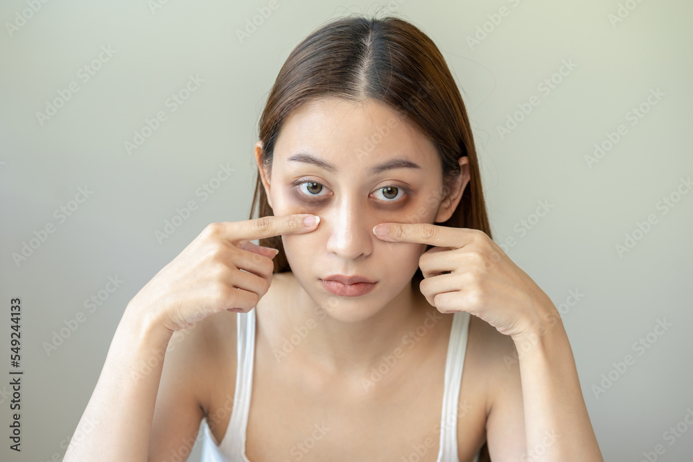 Bored, insomnia asian young woman, girl looking at camera, hand ...