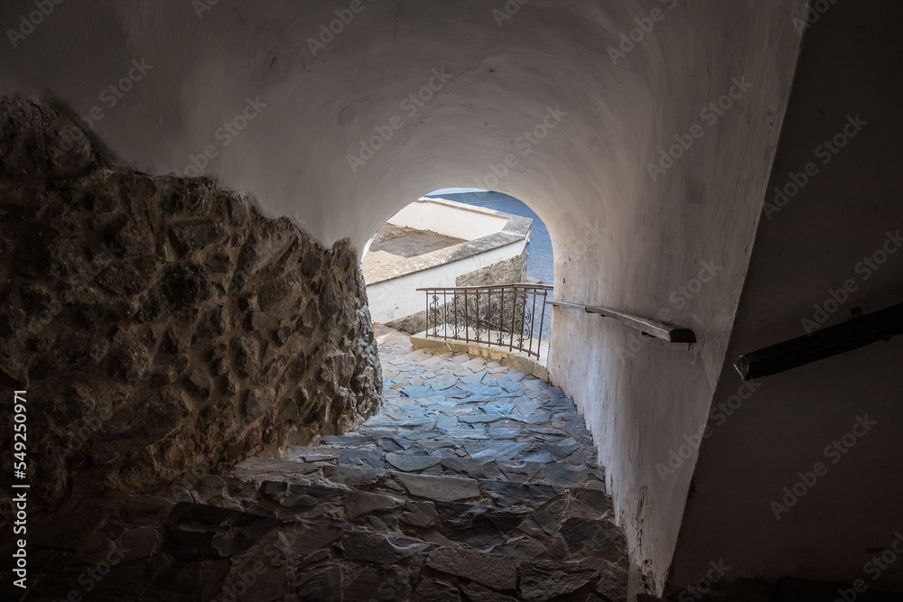 Passage between two parts of the ancient castle with an old stone ...