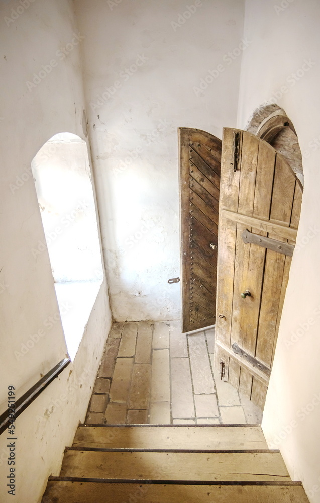 Passage between two parts of the ancient castle with an old stone ...