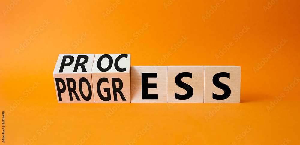 Process and Progress symbol. Turned wooden cubes with words Process and ...