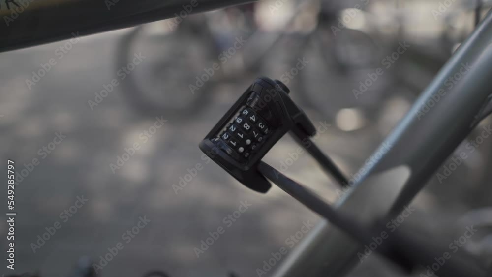 Securing bicycles against theft or stealing. Close-up of a folding ...
