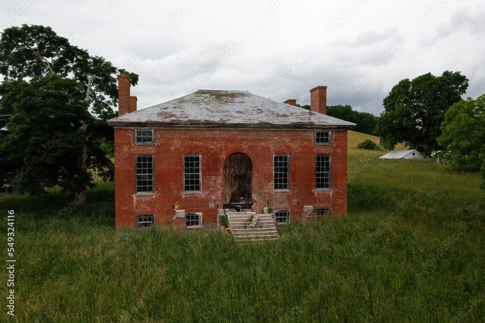 Abandoned Georgian Revival House - Historic Brick Building with Four ...