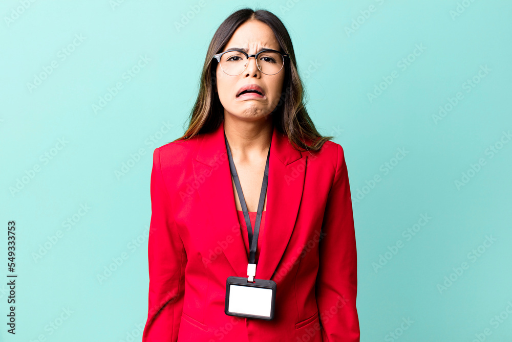 hispanic pretty woman feeling sad and whiney with an unhappy look and ...